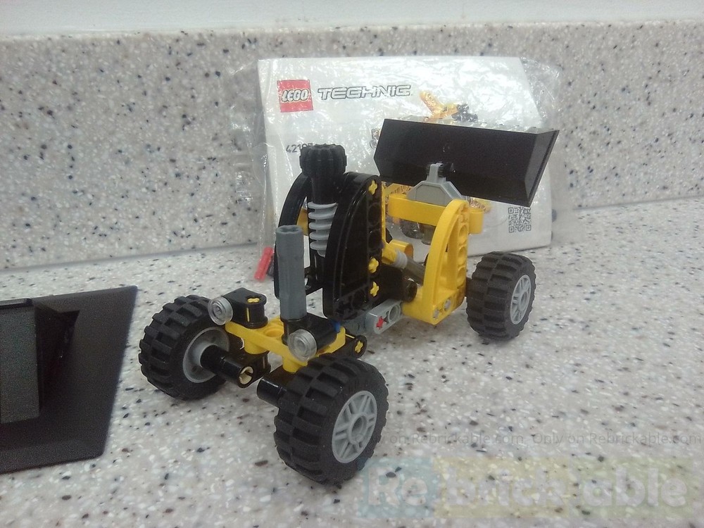 LEGO MOC 42197 transforming front loader by Team5tellaris | Rebrickable ...