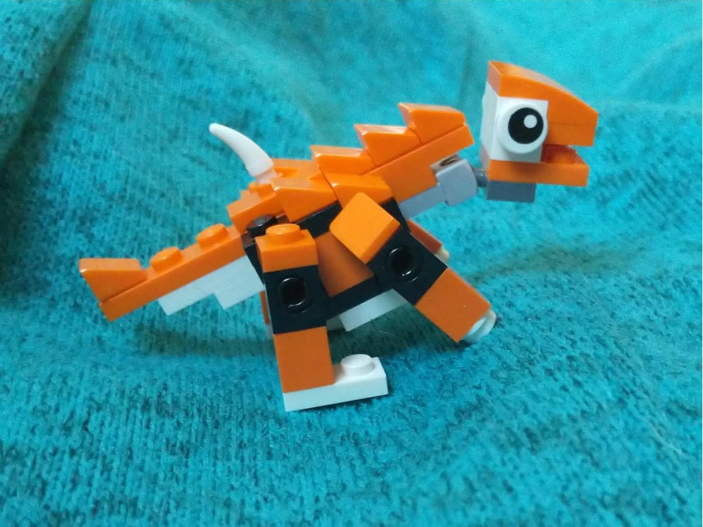 LEGO MOC Tiny Dino by kamila | Rebrickable - Build with LEGO