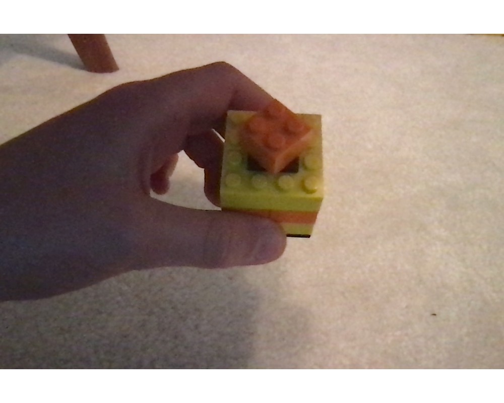 LEGO MOC tiny orange and yellow present by erger561 | Rebrickable ...
