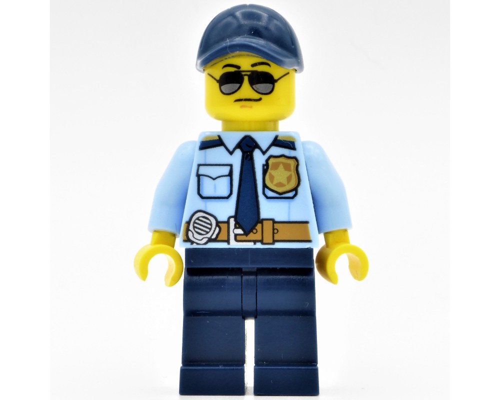 LEGO Set fig-001924 Policeman, Bright Light Blue Shirt with Dark Blue ...