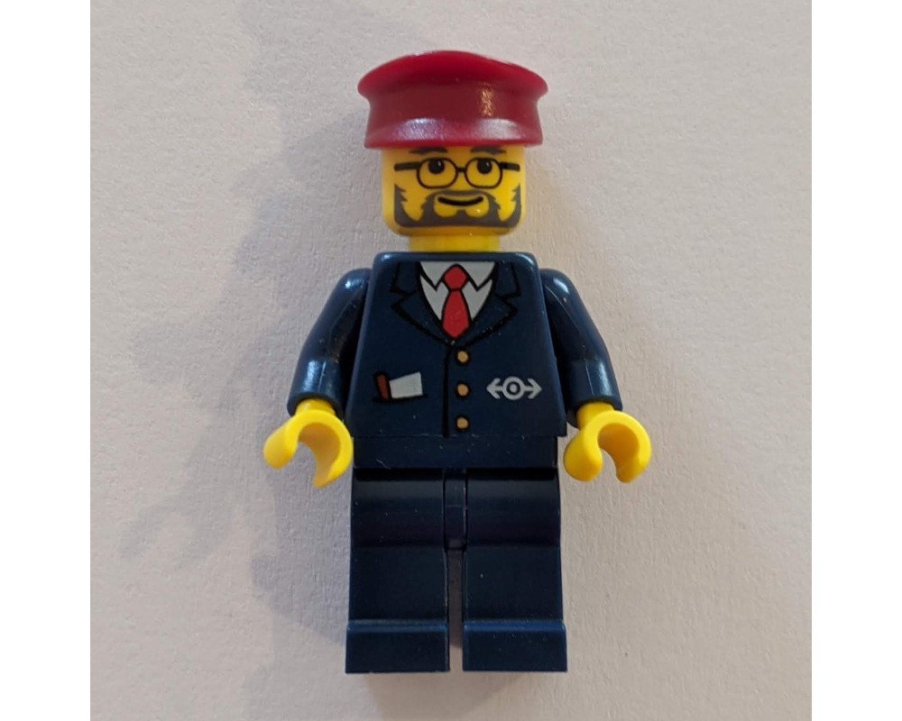 LEGO Set fig-004817 Conductor - Dark Blue Jacket, Dark Blue Legs, Dark ...