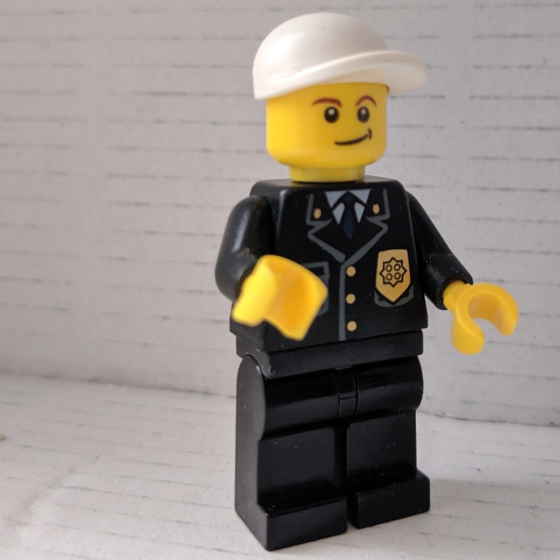 LEGO Set fig-007799 Policeman, Black Suit with Badge, White Cap ...