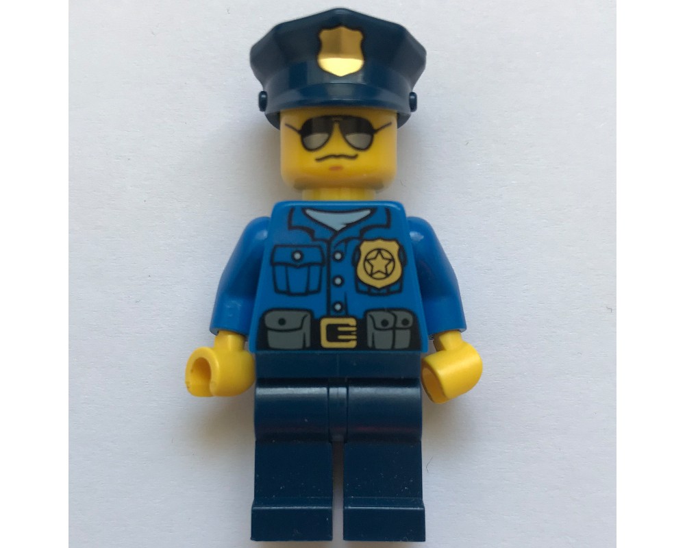 LEGO Set fig-007856 Policeman, Blue Shirt with Badge and Pouches, Dark ...