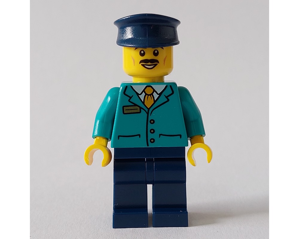 LEGO Set fig-012808 Train Driver, Dark Turquoise Jacket, Dark Blue Hat ...
